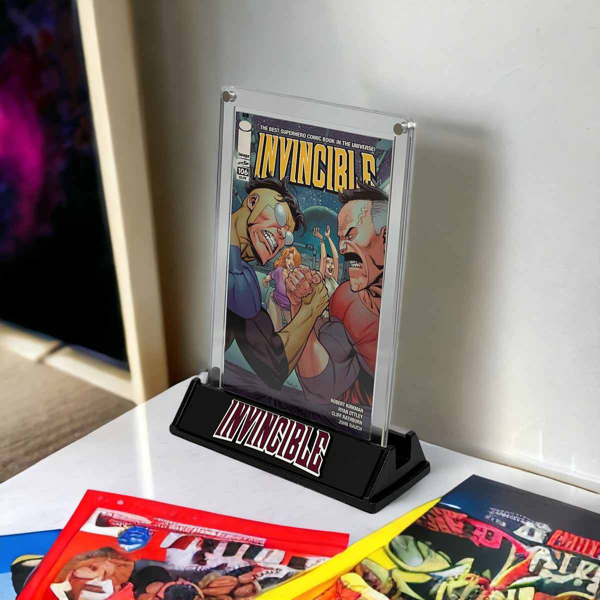 Invincible Comic Stand (Purple and White) – Red Wolf Collectibles