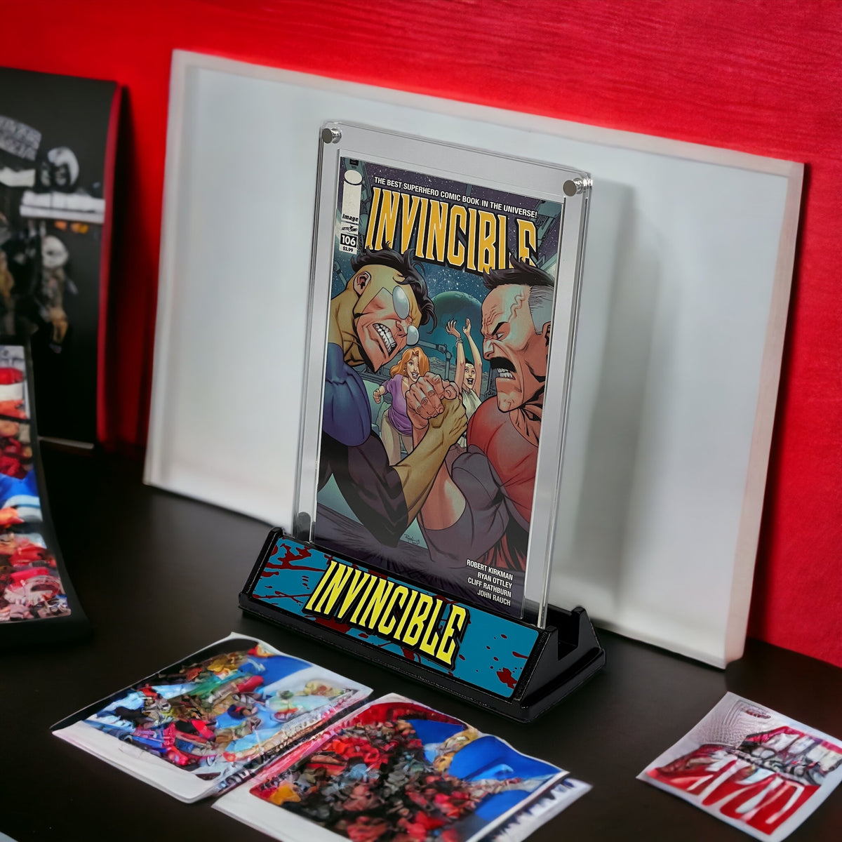 Invincible Comic Stand (Blood Splatter) – Red Wolf Collectibles